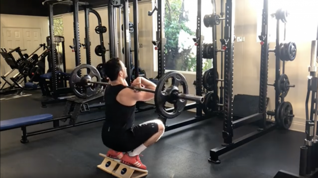 Elevate Your Squat Game: The Front Quad Squat - Human Strength Hub